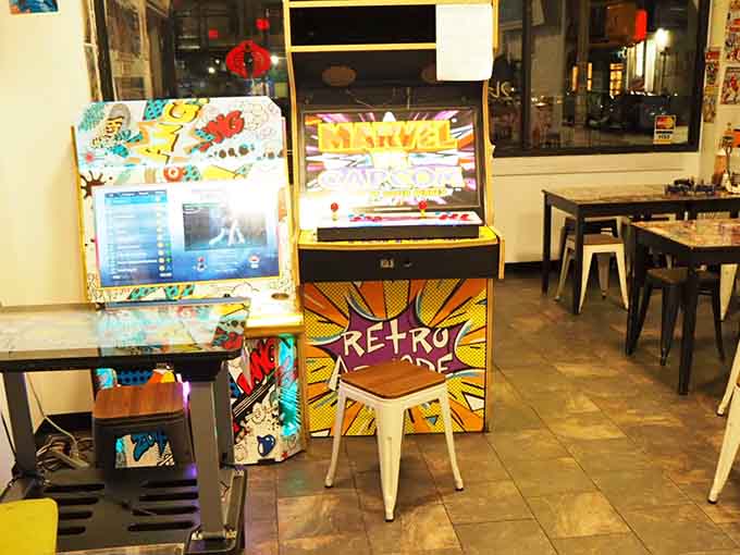 Retro arcade cabinets standing ready for action, waiting to settle decades-old sibling rivalries once and for all.