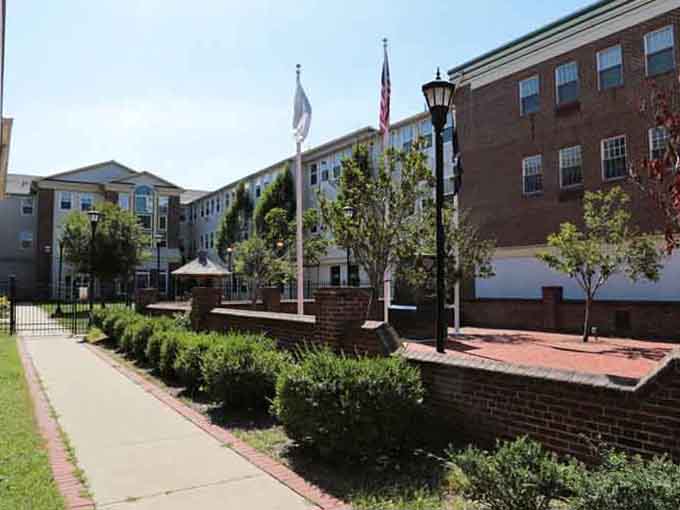 Brick pathways and manicured landscaping show Salem's commitment to maintaining its historic character with contemporary care and pride.