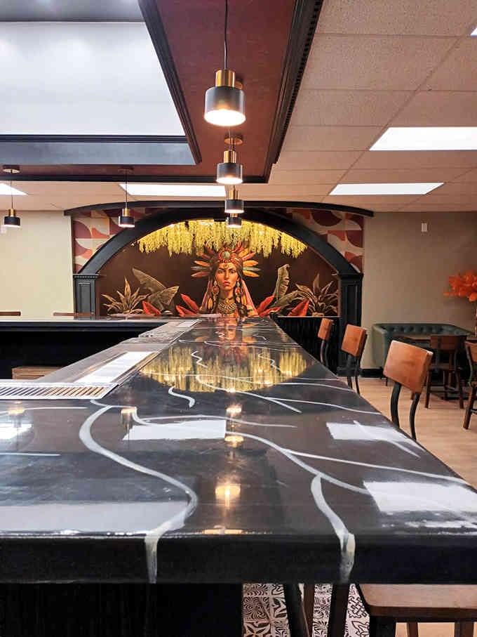 Bar seating with a view of the action, perfect for those who like their dinner with entertainment.