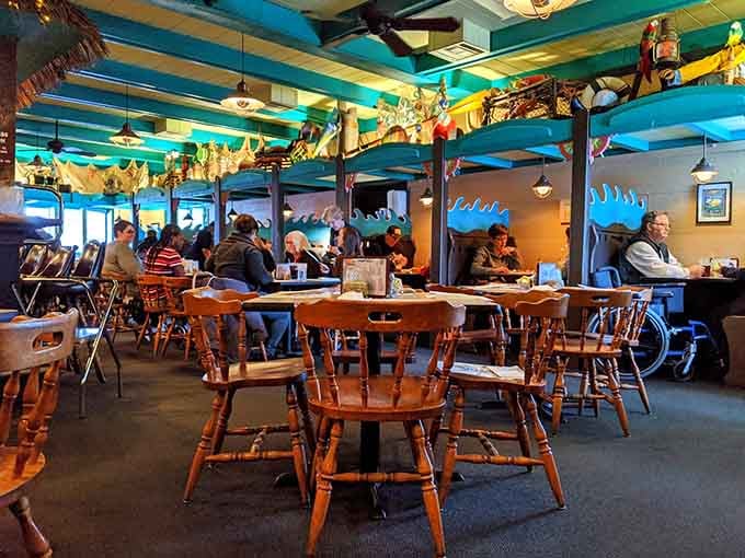 Comfortable seating and ocean-blue accents throughout make lingering over your meal feel like a mini vacation escape.