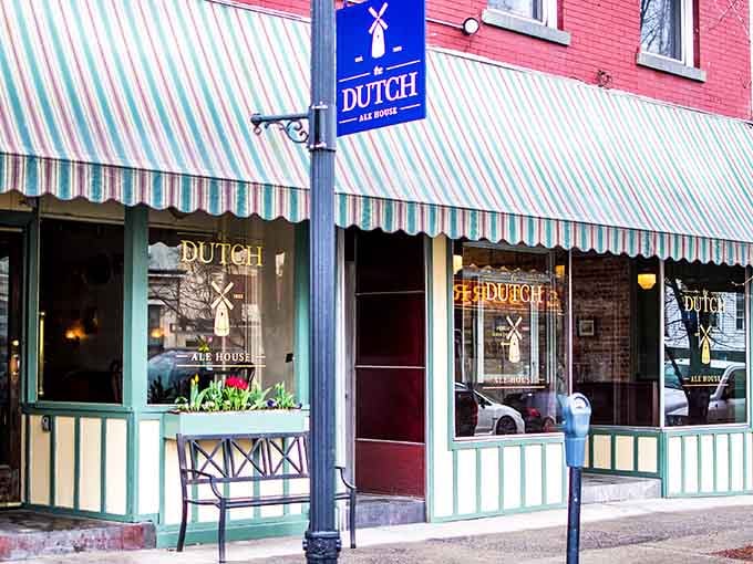 The Dutch Ale House's striped awning signals good times ahead, craft beer flowing, and pub fare done right.