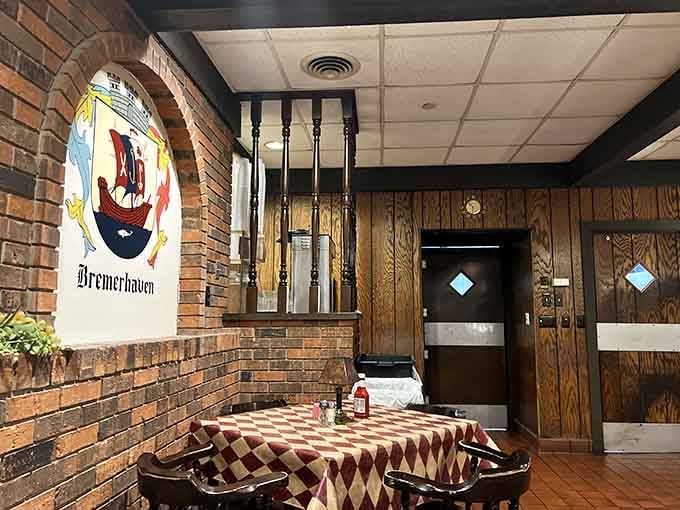 Cozy seating areas adorned with historic Jasper photos remind you this place is deeply rooted in community history.