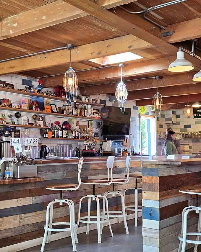 Reclaimed wood and pendant lights create a cozy vibe that says "stay awhile" while your breakfast settles into pure happiness.