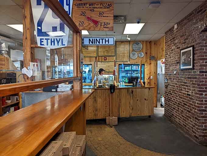 That counter has seen decades of hungry customers placing orders, each one about to experience pizza perfection.