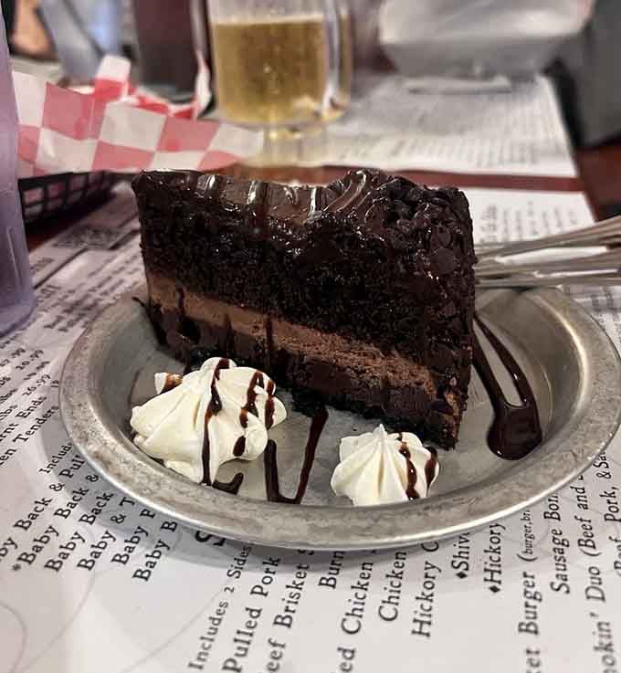 This towering chocolate cake could make even the most disciplined dieter reconsider their life choices completely.