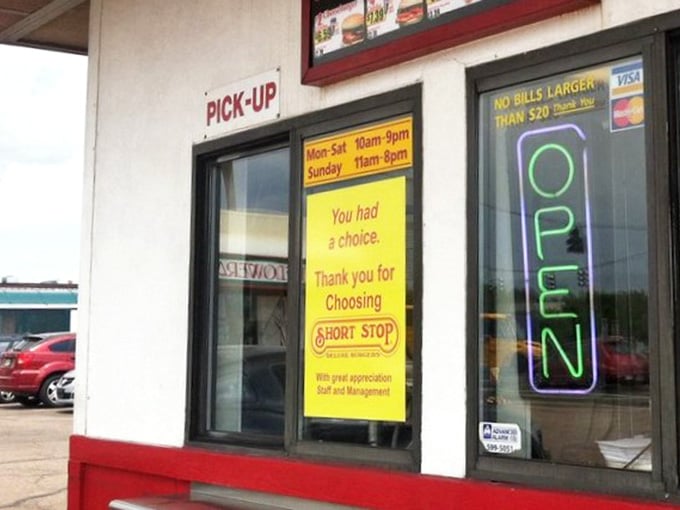 The pickup window where patience is rewarded with paper bags full of exactly what you came here for.