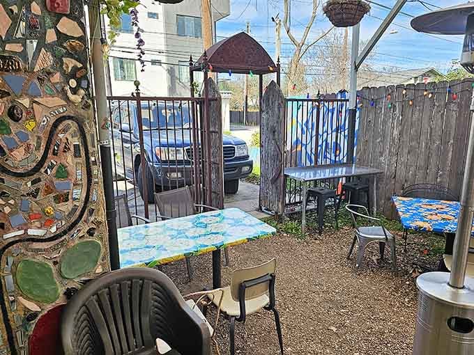 The outdoor patio beckons with colorful tables and artistic touches, creating an alfresco dining experience worth savoring slowly.