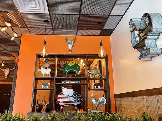 That orange-framed display case holds animal figurines, but the real beasts are smoking out back right now.