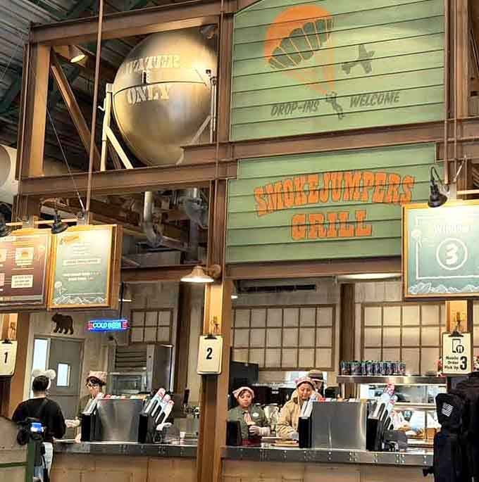 The order counter channels vintage ranger station vibes while efficiently processing hungry guests with modern speed.