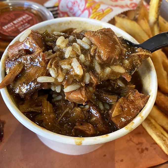 Gumbo studded with smoky meat over rice proves Southern comfort knows no boundaries when creativity meets tradition beautifully.