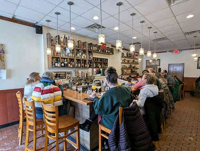 That bar area with local art on exposed brick walls adds character that chain restaurants could never replicate.