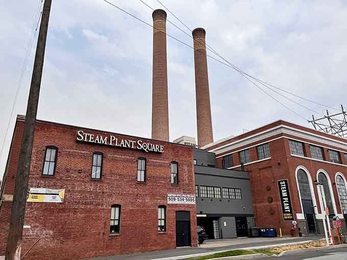 Steam Plant Square's twin smokestacks stand as industrial monuments transformed into vibrant community spaces.