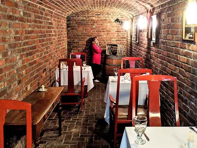 Arched brick ceilings in the cellar dining room make every meal feel like a secret discovery.