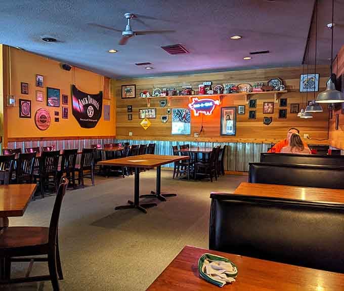 Booth seating, wood everywhere, and enough barbecue memorabilia to make any pitmaster feel right at home.