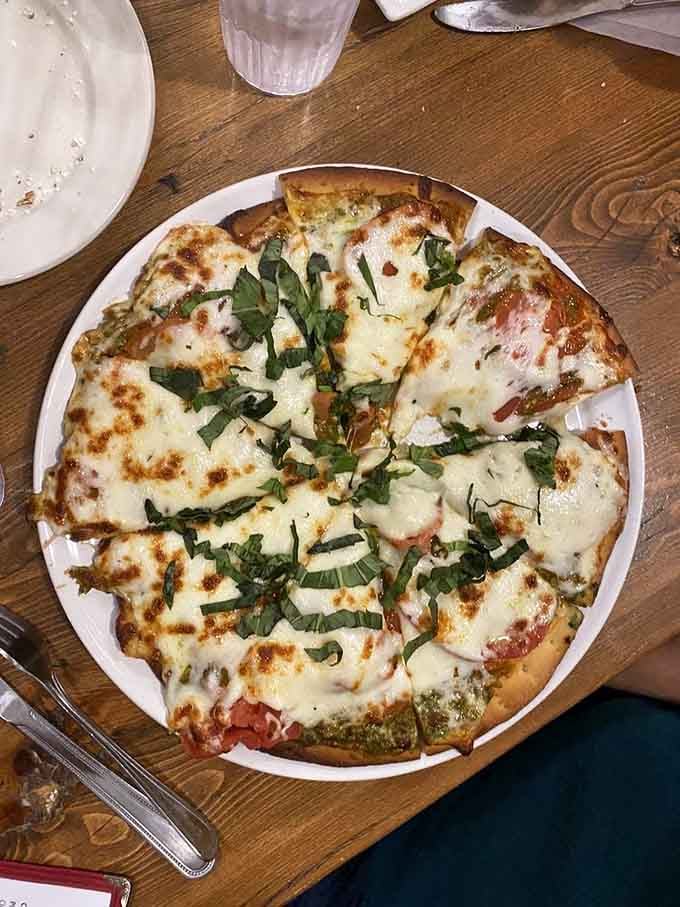 Fresh margherita pizza with basil that proves even breweries can nail the classics when they put their minds to it.