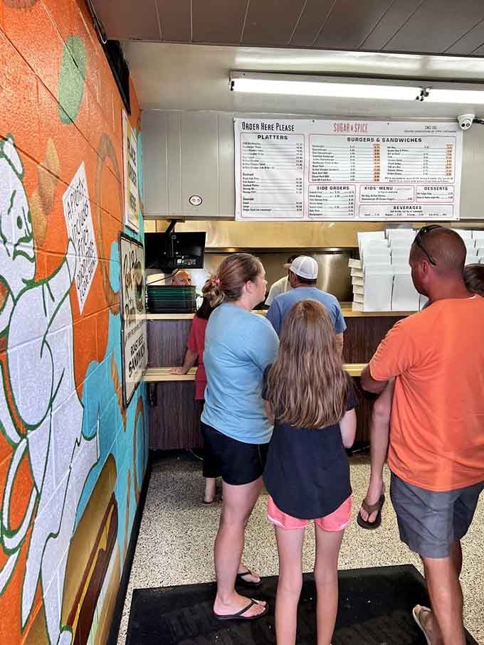 The line at the order counter moves fast because these folks have been perfecting their system longer than most.