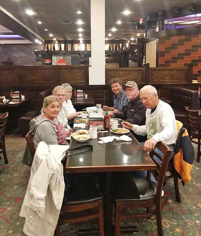 Happy diners who've discovered that the secret to family harmony is letting everyone choose exactly what they want.