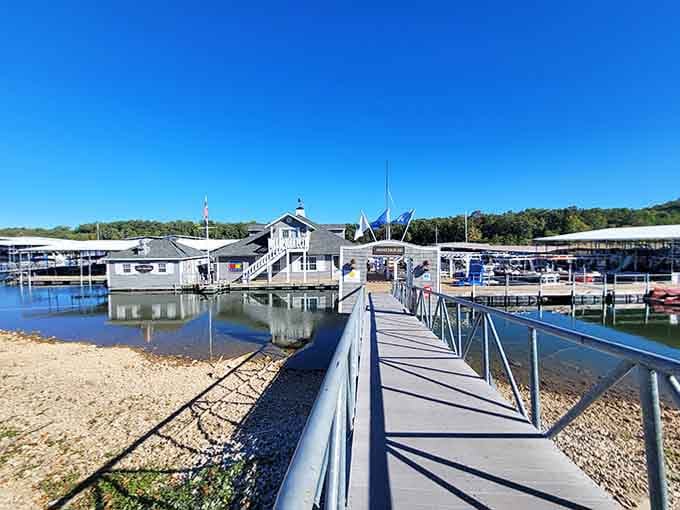 The marina's floating buildings bob gently on crystal-clear water, ready to launch your next aquatic adventure in style.