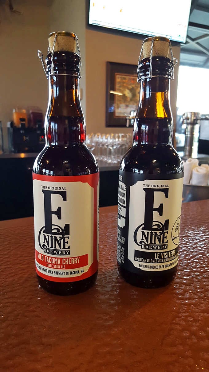 E9 Brewery bottles sitting pretty on the bar, representing the Pacific Northwest craft beer scene in all its glory.