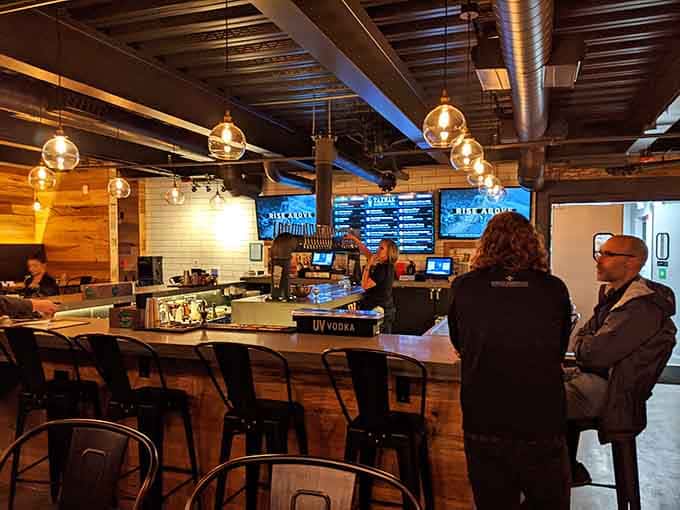 The bar area beckons with promises of craft brews and good times, a combination that rarely disappoints anyone.