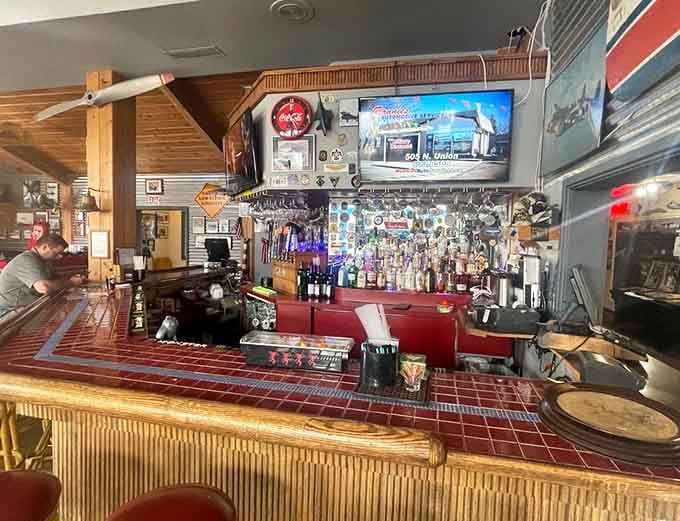 The bar area serves up drinks with a view that beats any airport lounge you've ever waited in.