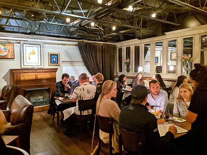 The dining room buzzes with that perfect energy where everyone's having their own great time without disturbing yours.