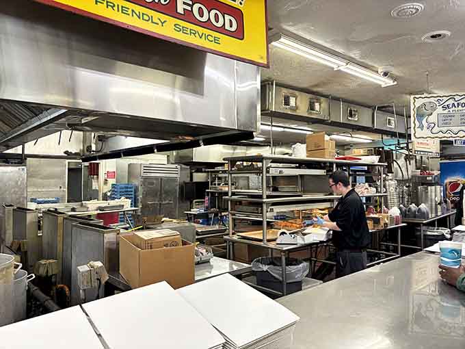 The kitchen hums with efficiency, where "fast food" meant something entirely different before drive-thrus took over America.