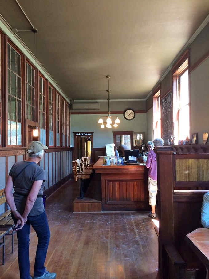 The bar area invites you to settle in with a cold drink while your handcrafted pizza works its magic.