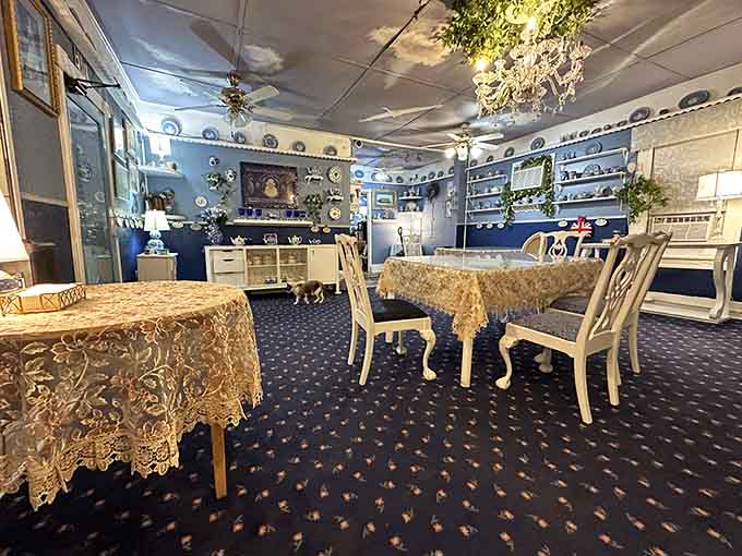 Lace tablecloths and mismatched chairs create the kind of grandmother's dining room aesthetic that somehow feels both fancy and wonderfully informal.