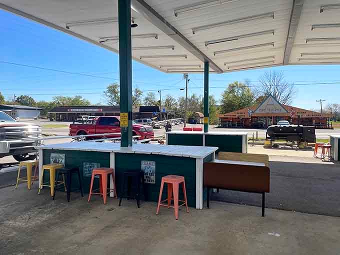 Covered outdoor seating with colorful stools means you can enjoy your meal al fresco, rain or shine, any season.