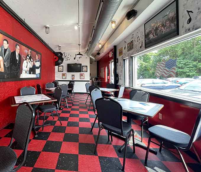 Red booths and vintage vibes create the perfect atmosphere for serious eating at The Gem Diner.
