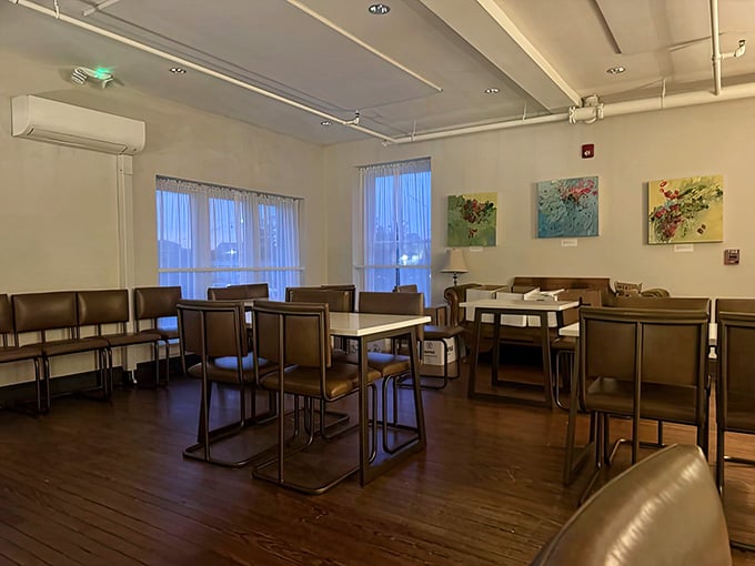 Upstairs seating offers a quieter dining option with the same attention to detail and comfortable, modern aesthetic throughout the space.