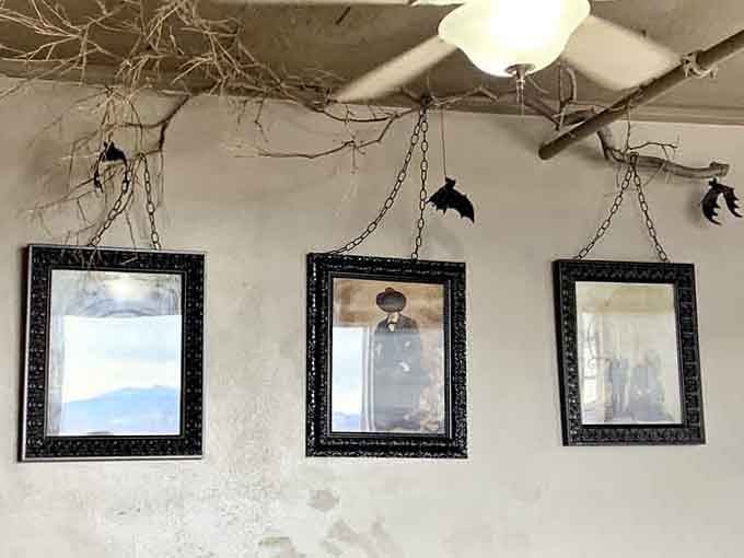 Vintage photos and spooky touches remind you this building has stories, and probably a few permanent residents.