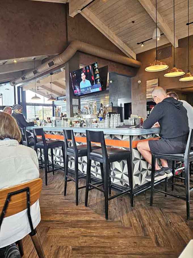 The bar beckons with craft cocktails and local brews, where bartenders actually know what they're doing with spirits.