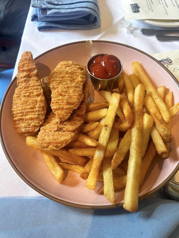 Golden chicken tenders and fries that remind you comfort food transcends every generation and historical period imaginable.