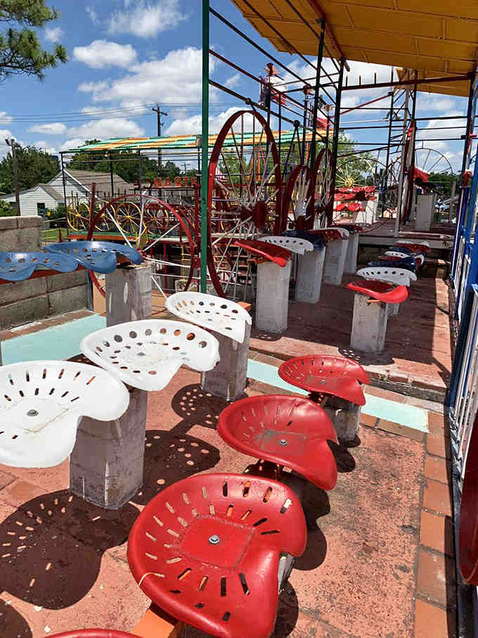 Tractor seats become spectator seating because why use regular chairs when you can use farm equipment?