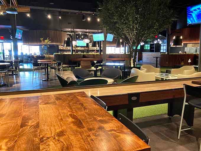 Modern lounge seating creates cozy spots to recover between games or just enjoy the whole scene unfold.