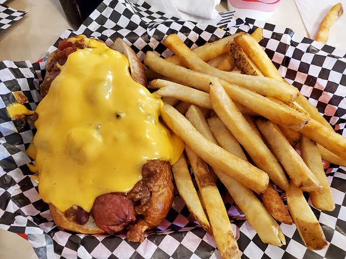 Chili cheese dog with fries, proving that sometimes the simplest pleasures are the ones that make life worth living fully.