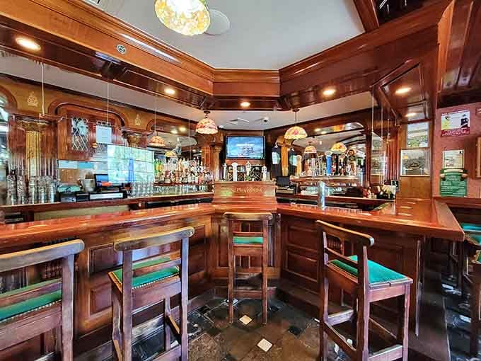 That gleaming bar with emerald stools invites you to settle in and solve the world's problems over a cold one.