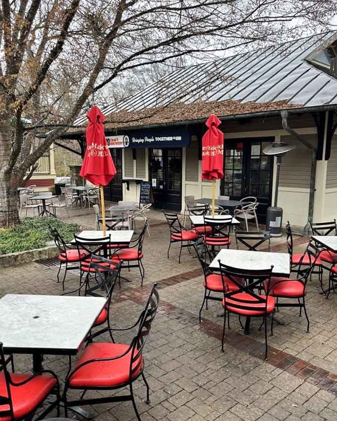The patio where good weather, red chairs, and cold drinks conspire to make you cancel your afternoon plans.