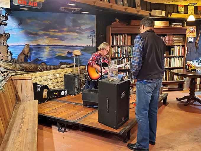 Live music and bookshelves create an unexpectedly cozy atmosphere that makes lingering over dinner feel absolutely right.