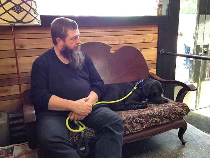 That waiting bench has seen countless patient pups and their equally patient humans awaiting breakfast glory.