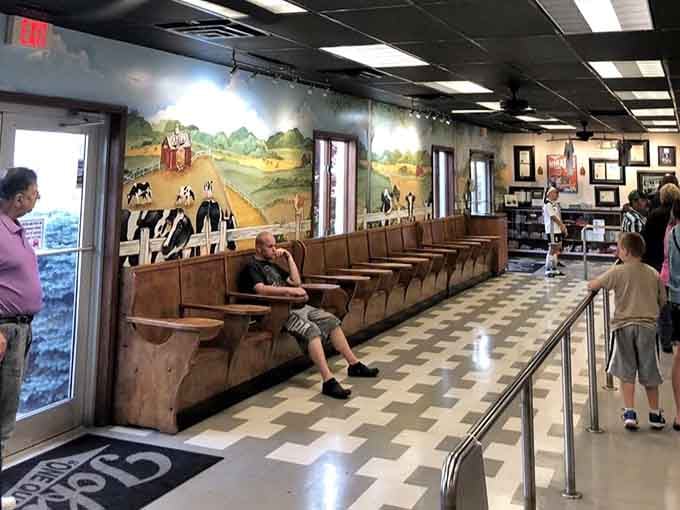 Families gather inside where murals of grazing cows remind everyone exactly where this exceptional ice cream journey begins.