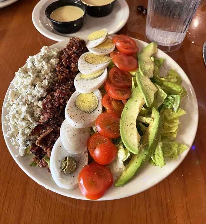This Cobb salad is so beautifully arranged with bacon, eggs, and avocado you almost feel guilty destroying it.