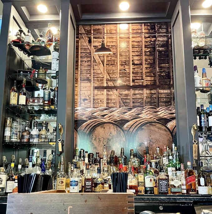 Behind that impressive bourbon selection, barrel imagery reminds you exactly where you are: the heart of Kentucky whiskey country.