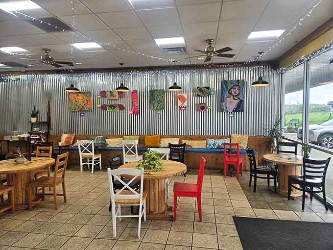 String lights and vibrant paintings transform this casual eatery into a space that feels both festive and homey.