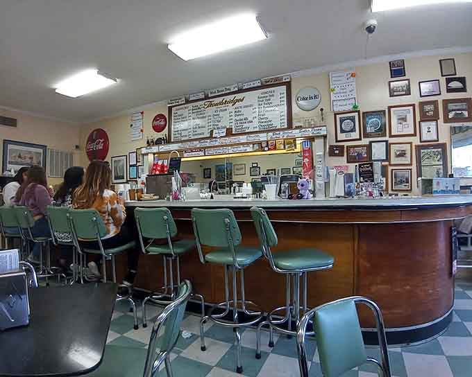 Those vintage green stools have supported more happy customers than a therapist's couch, with better results too.