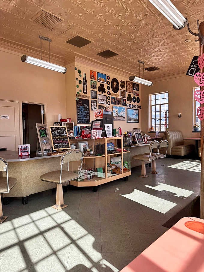The counter where orders happen and conversations flow, decorated with Route 66 memorabilia and small town Texas hospitality.