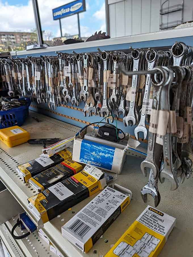Wrenches and hand tools hanging like a mechanic's dream, all waiting to fix things for pennies.