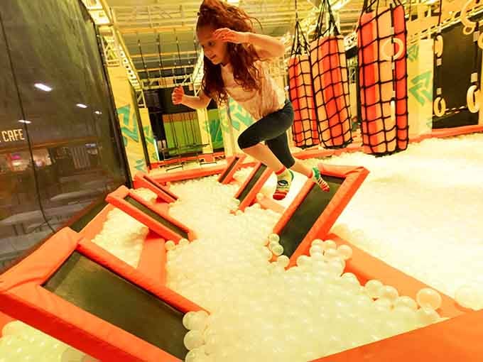 Mid-jump perfection captured, proving that for one glorious moment, we can all defy our earthbound existence.